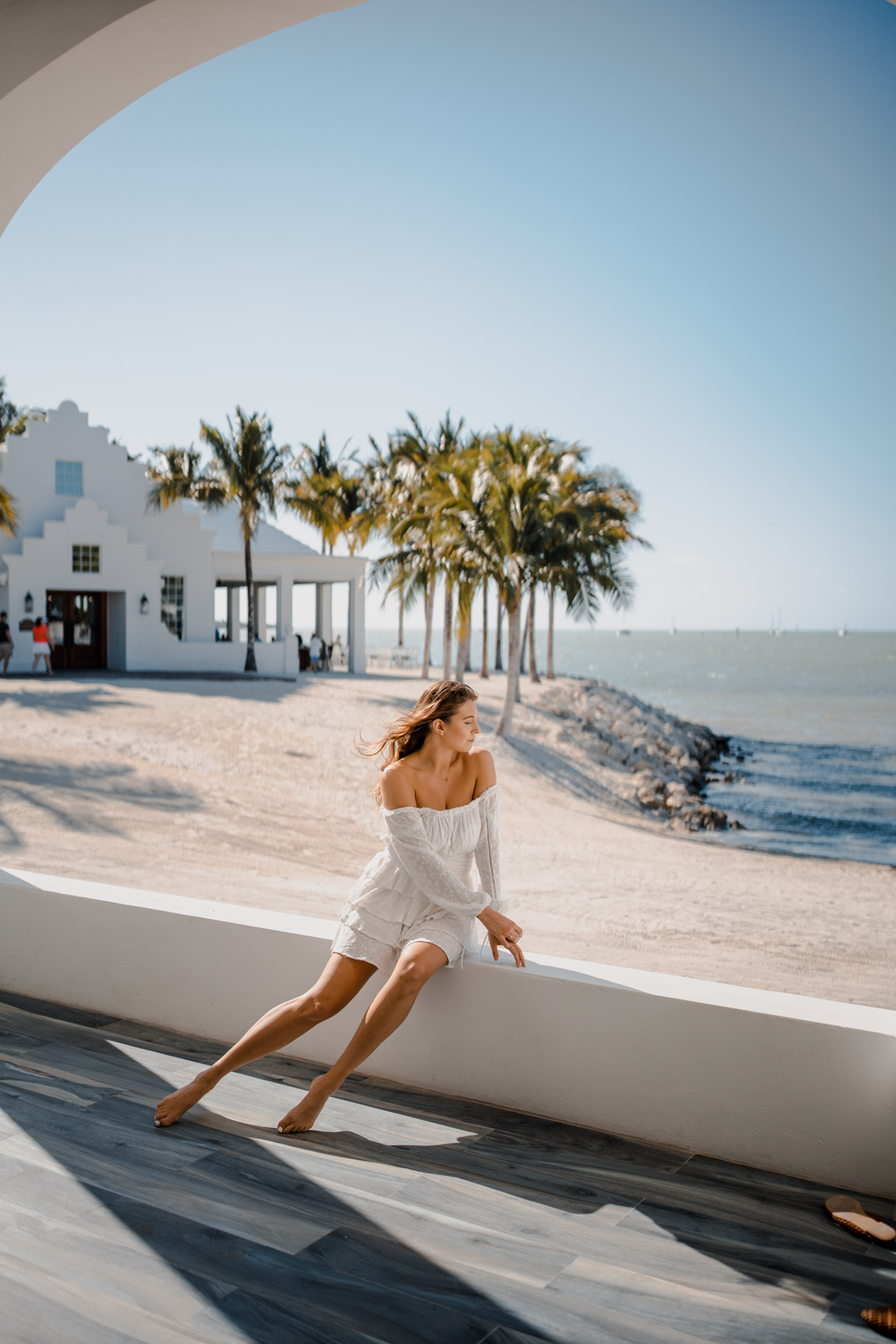 Sitting Poses for Photos: How to Pose Sitting Down - Dana Berez
